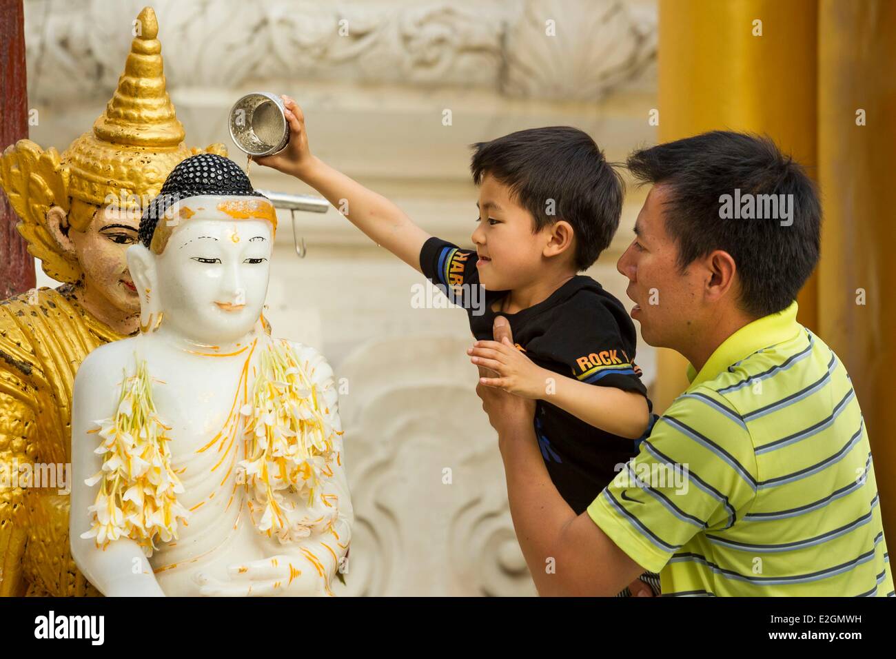 Myanmar (Burma) Yangon Division Yangon Shwedagon Pagoda father and son ...