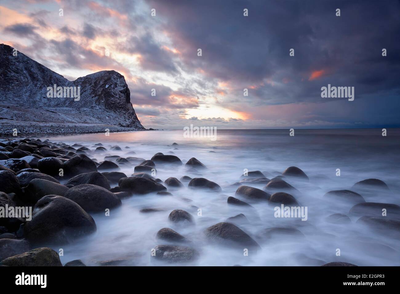 Norway Lofoten islands Vestvagoya sunrise on Unstad beach in winter ...
