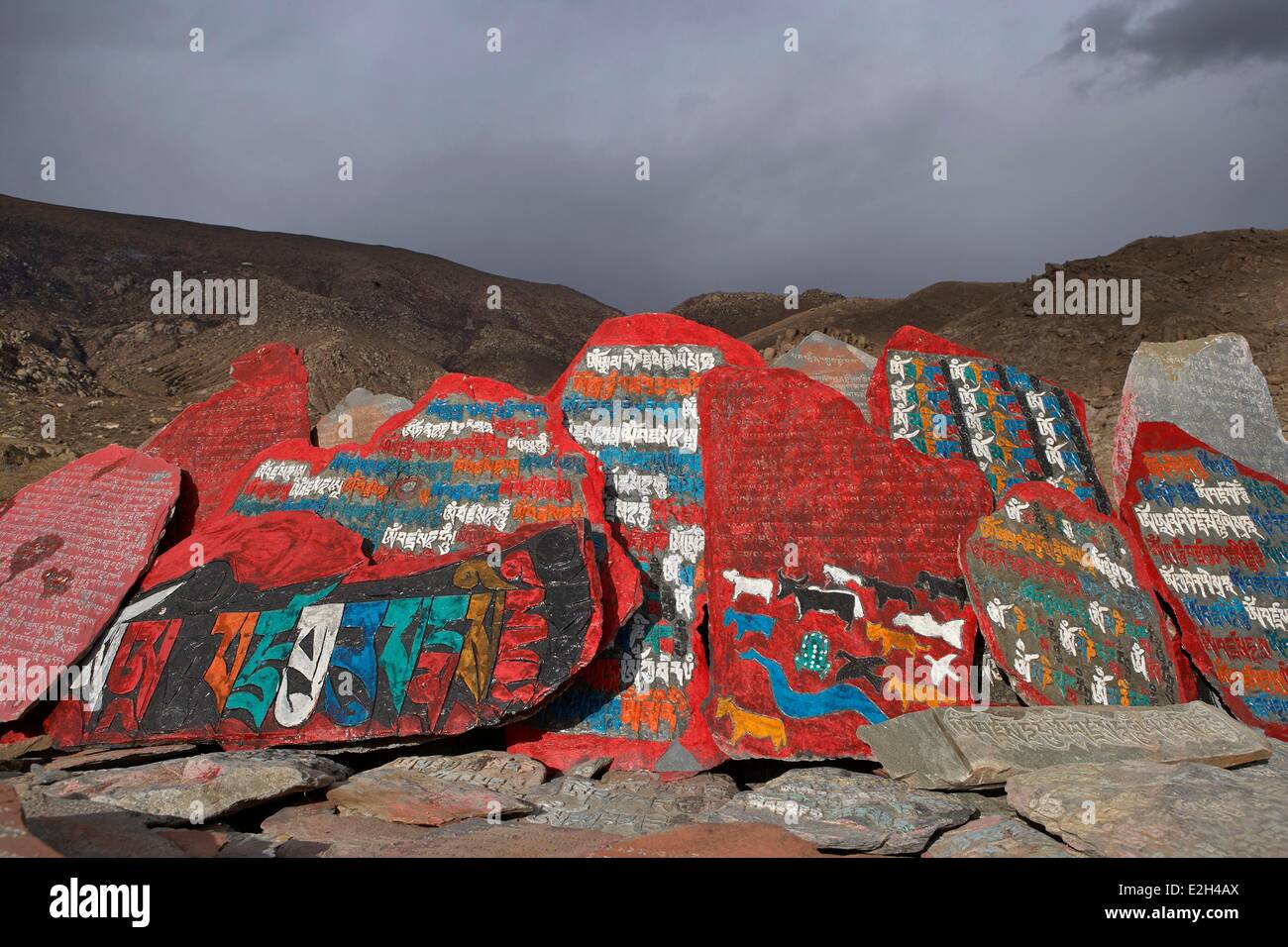 China Tibet Lhassa Mani wall stones carved with Buddhist prayers at ...