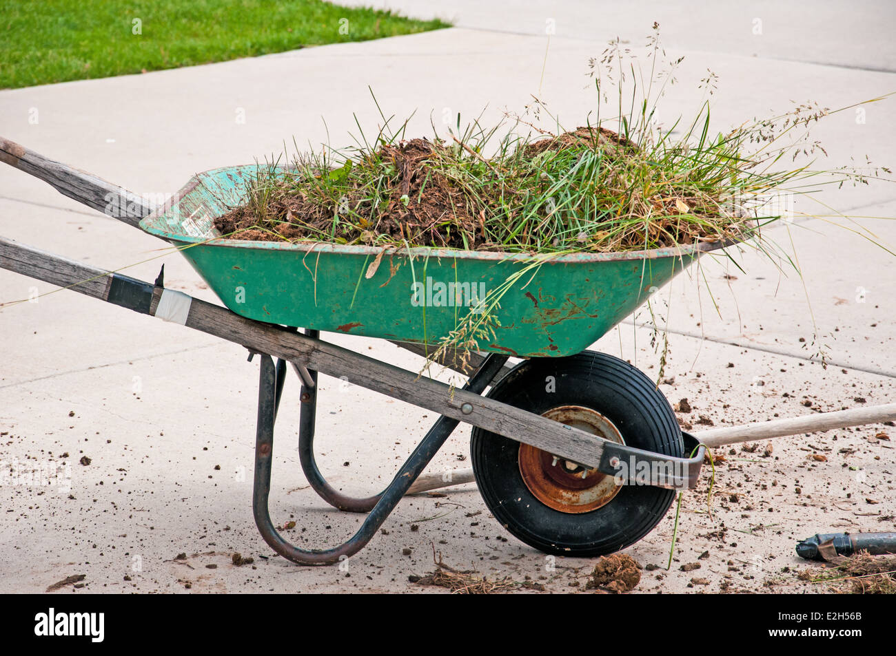 Old wheelbarrow still giving service after many years performing ...