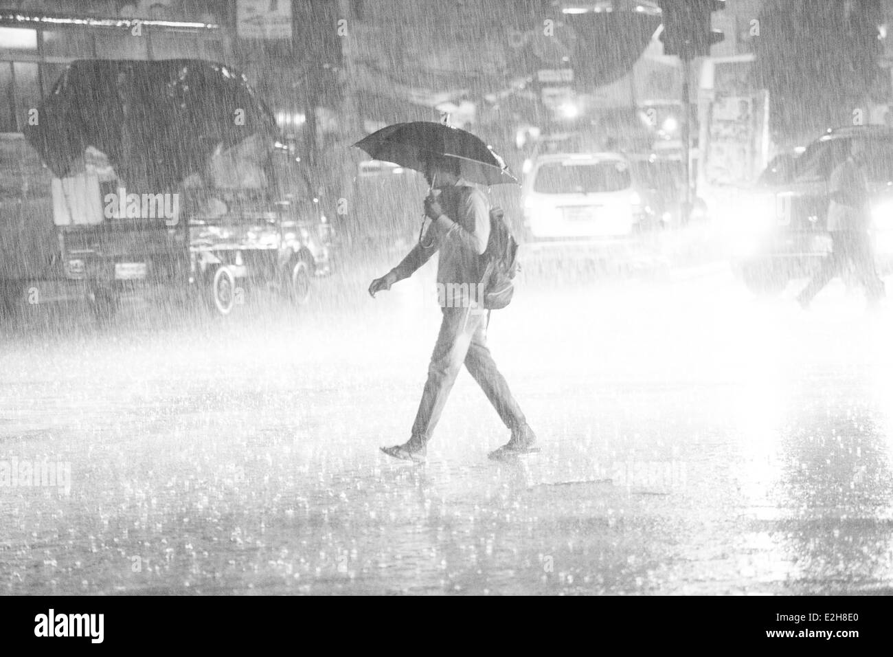 Enjoying the rain Black and White Stock Photos & Images - Alamy