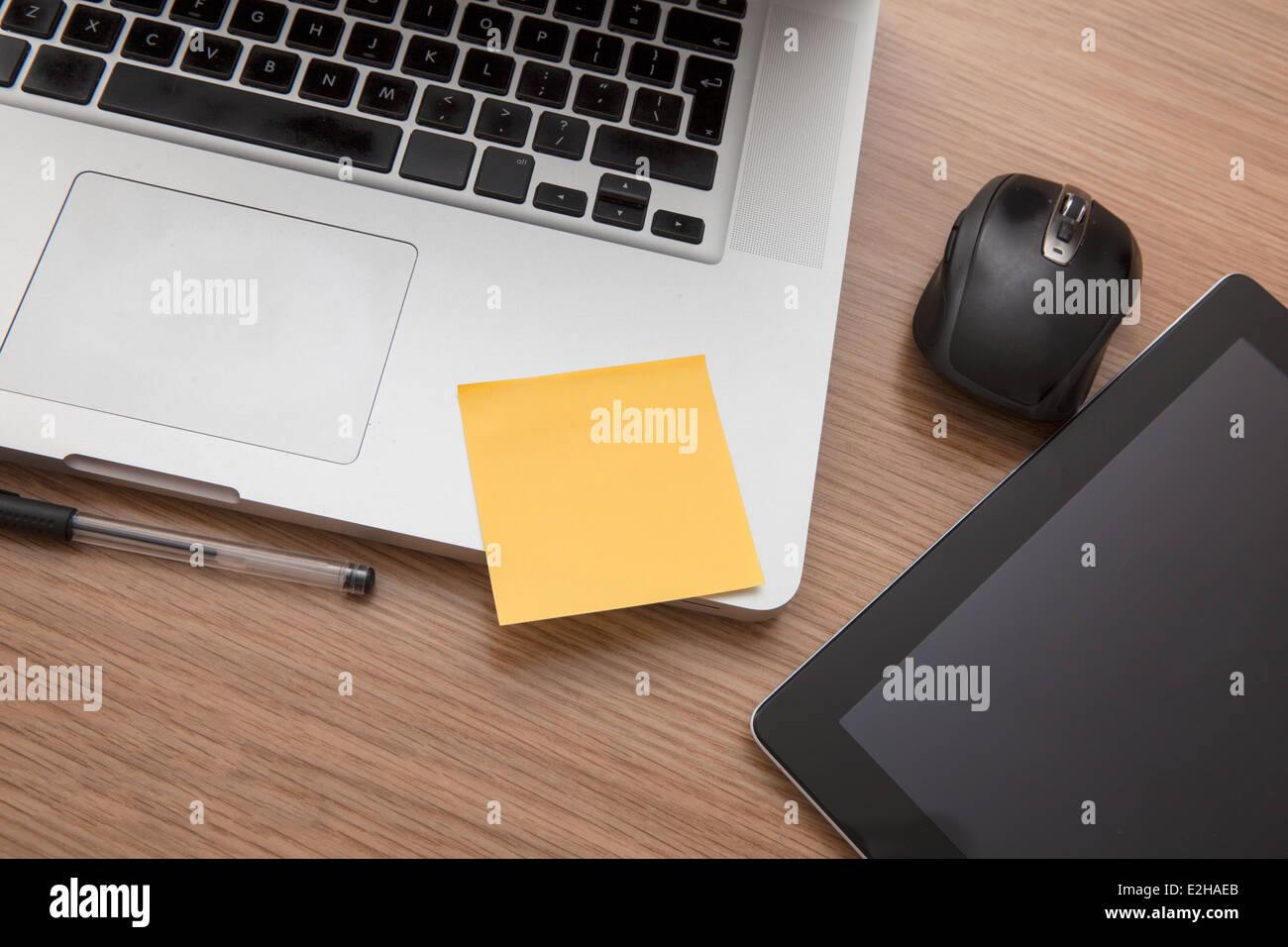 A modern desk with computer and tablet Stock Photo - Alamy