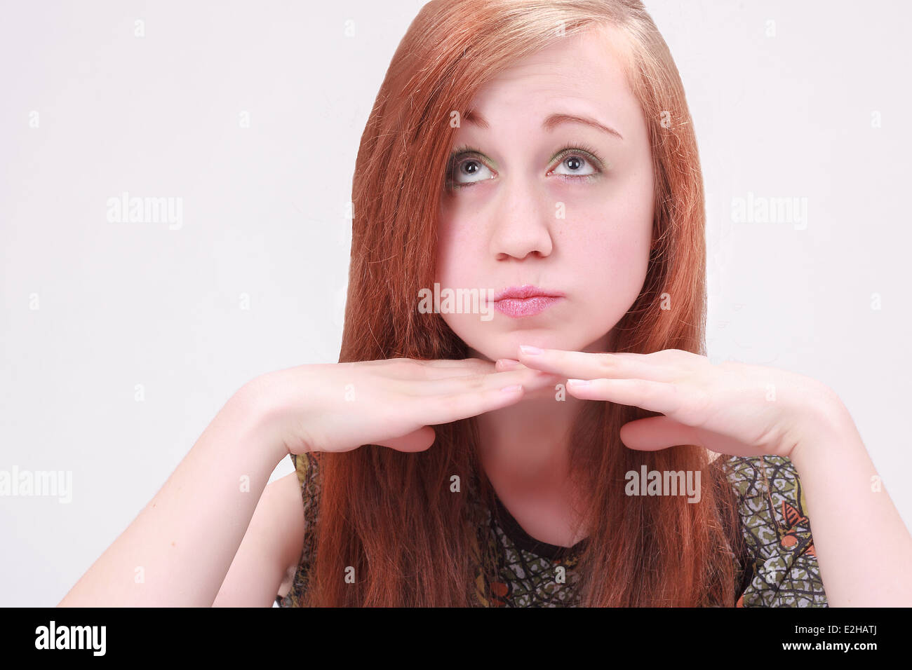 Woman hands under chin hi-res stock photography and images - Alamy