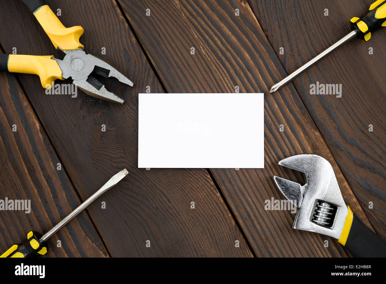 blank card and tools on wood Stock Photo - Alamy