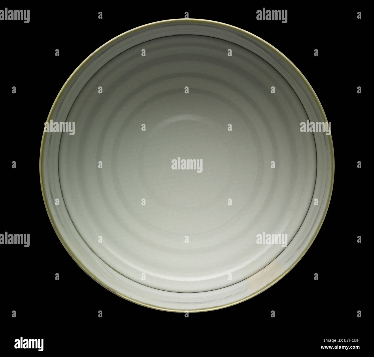 a open empty tin can in black back seen from above Stock Photo - Alamy