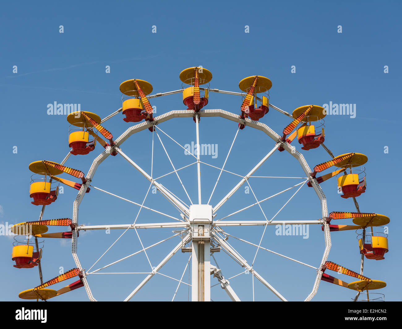 Fun Park Ferris Wheel Against Blue Sky Stock Photo - Alamy