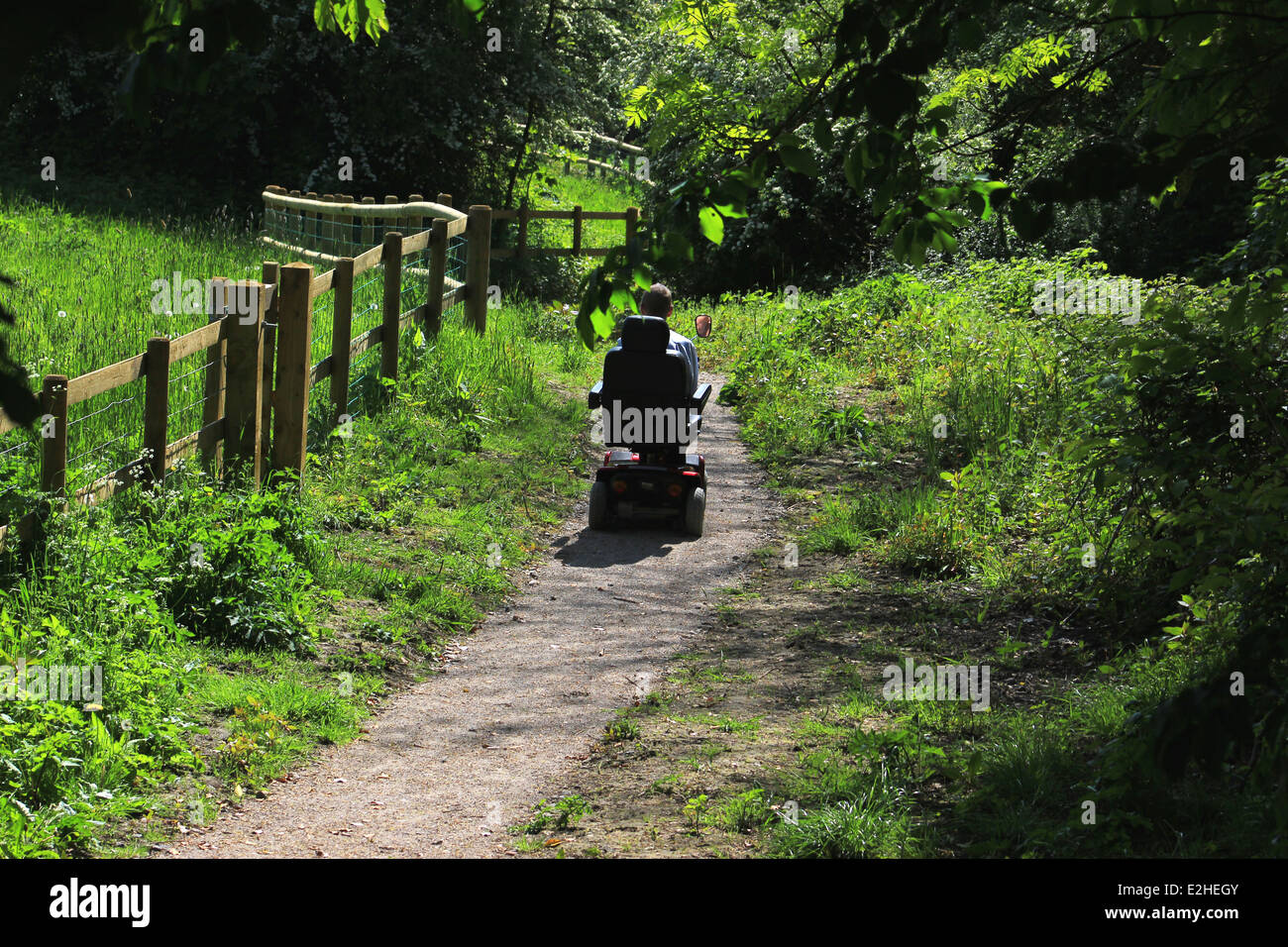 Mobility scooter on public footpath Stock Photo - Alamy