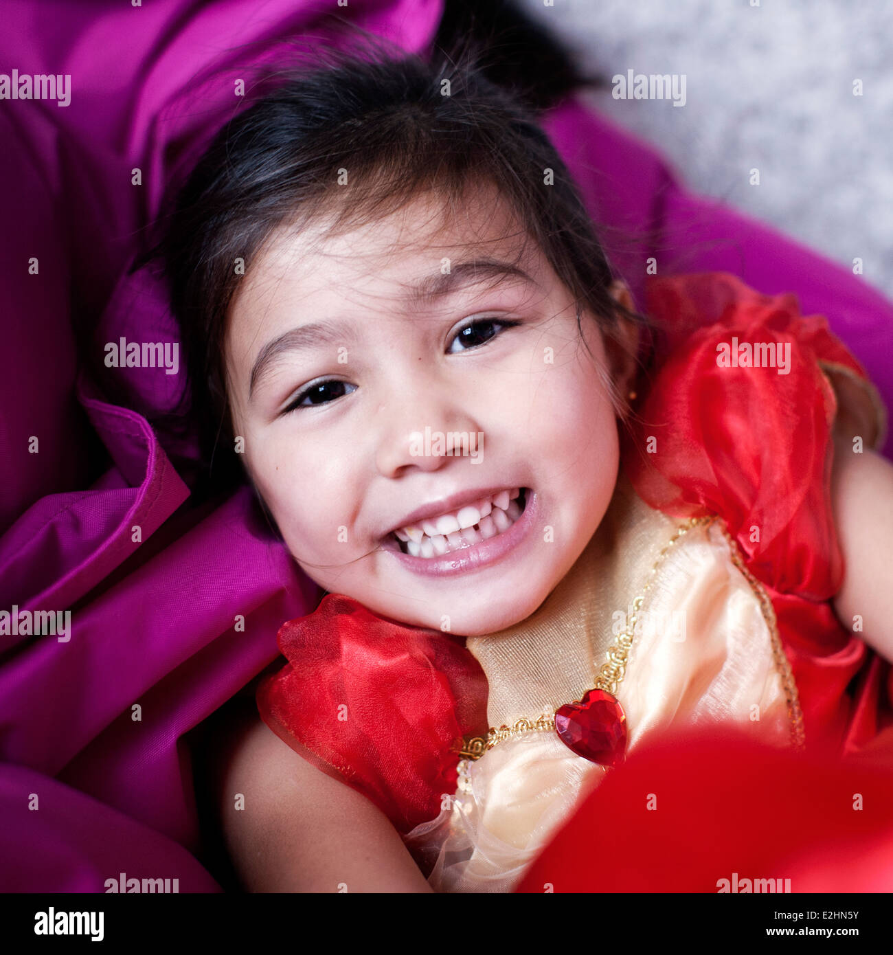 Girl smiling cheerfully, portrait Stock Photo - Alamy