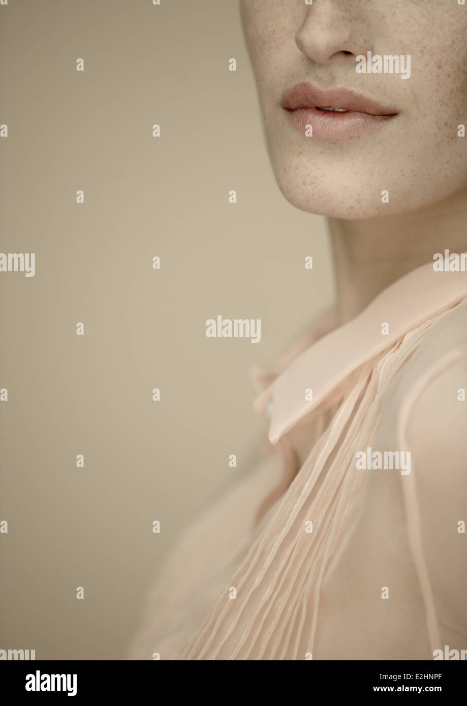 Woman wearing blouse, close-up of lower face and chest Stock Photo - Alamy