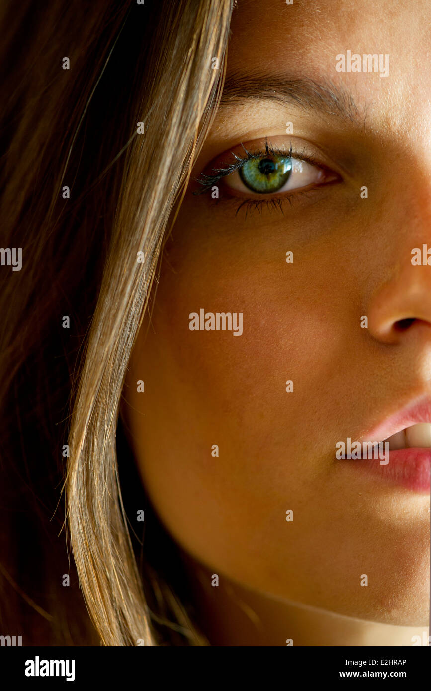 Half of woman's face Stock Photo - Alamy