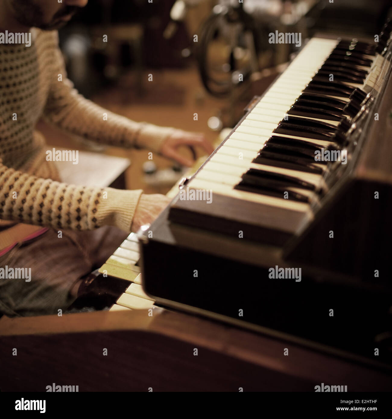 Musician playing organ Stock Photo - Alamy