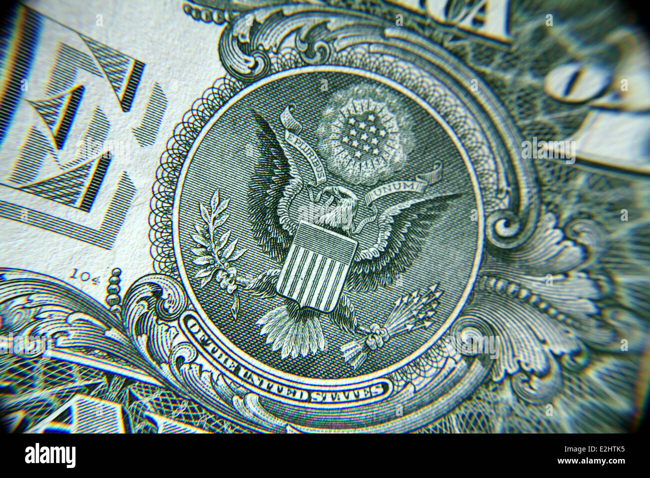 Close up detail of an American one dollar bill using a shallow depth of ...