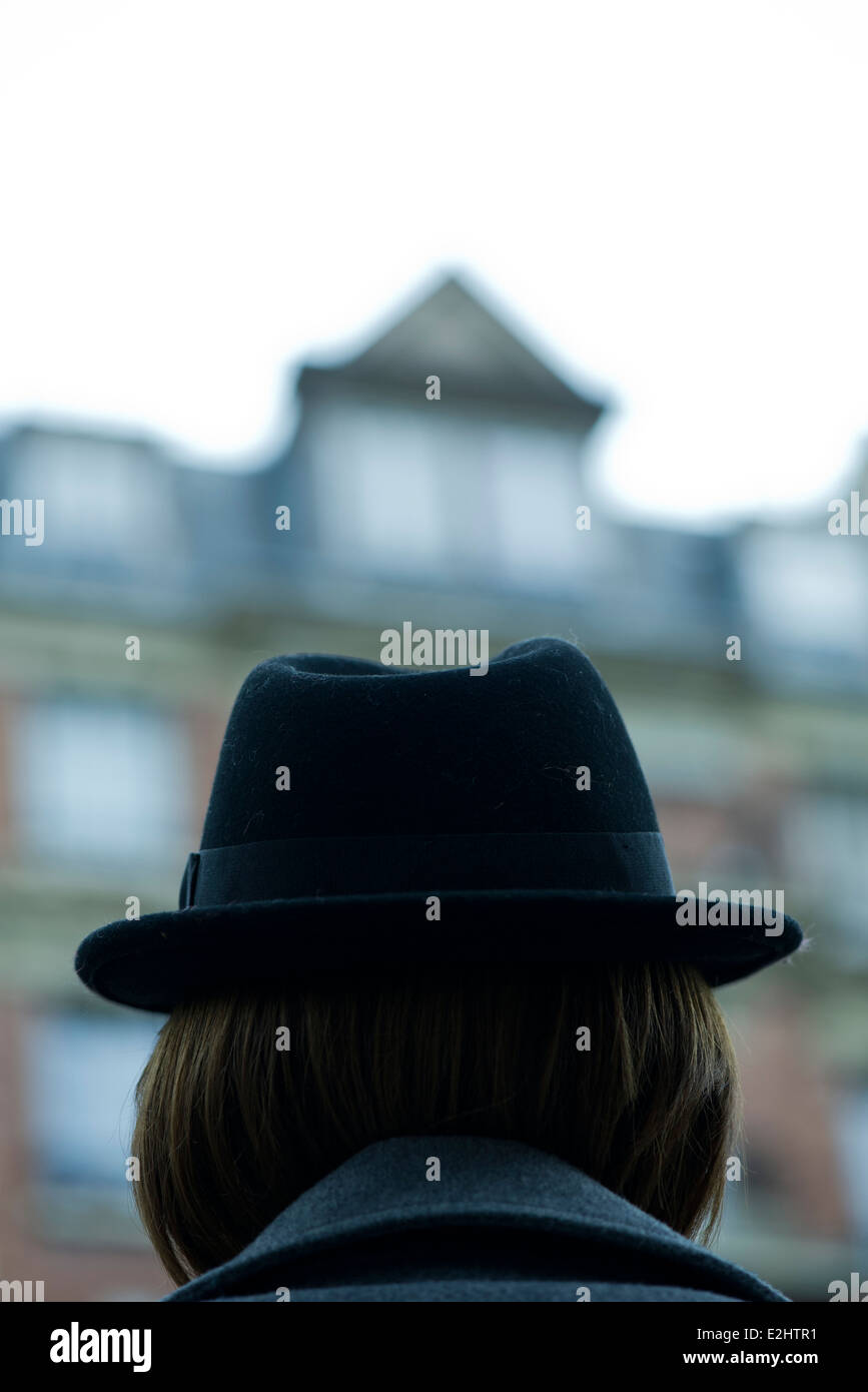Woman wearing fedora, rear view Stock Photo - Alamy