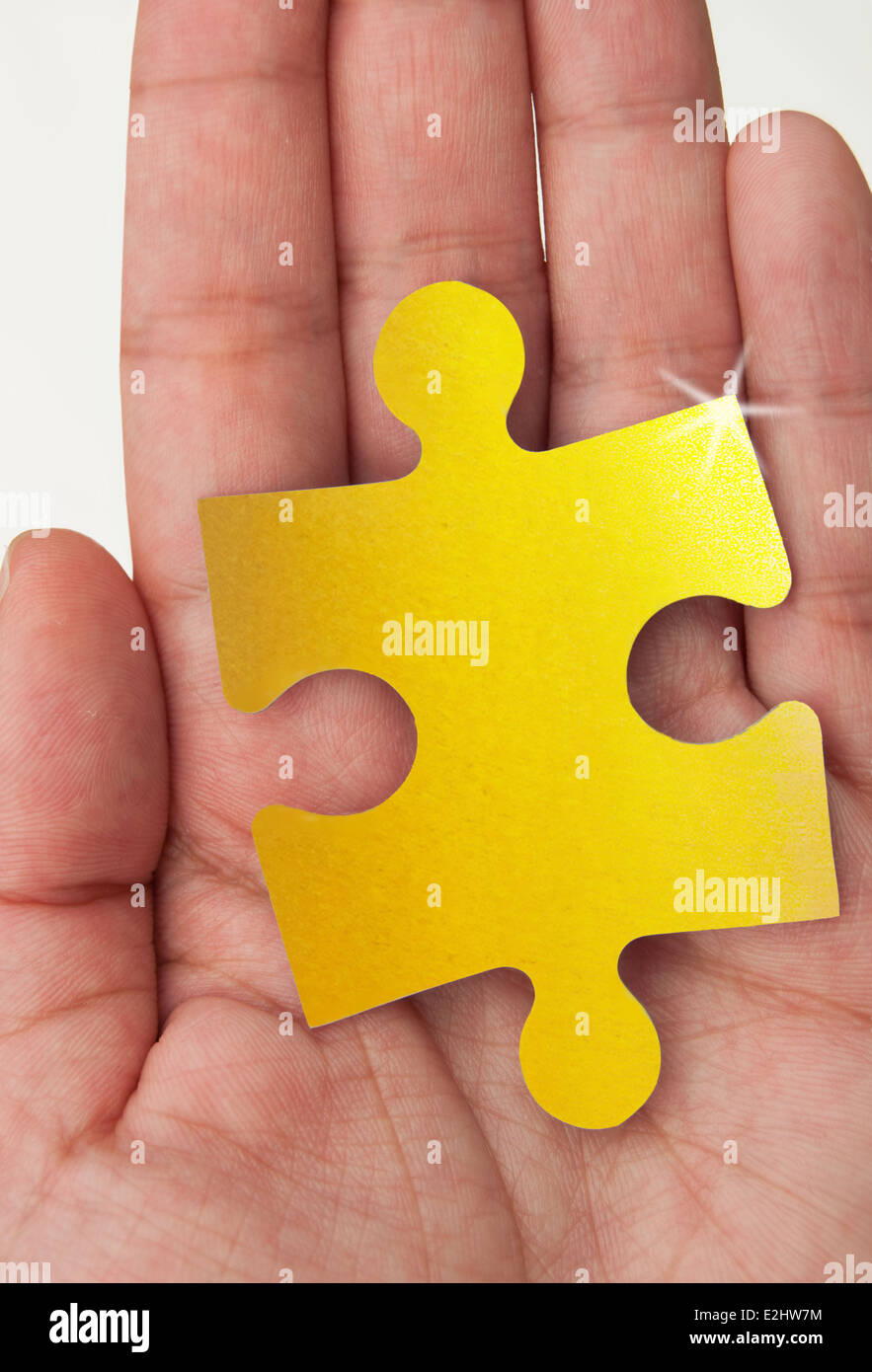 Gold jigsaw puzzle hi-res stock photography and images - Alamy