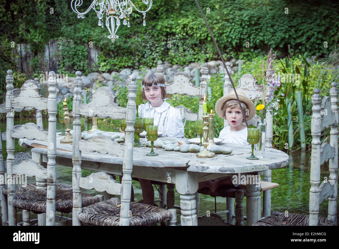 Children playing make-believe outdoors Stock Photo - Alamy