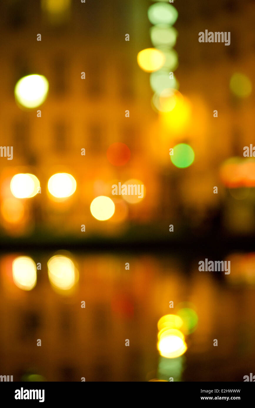 City lights reflected off of river surface Stock Photo - Alamy