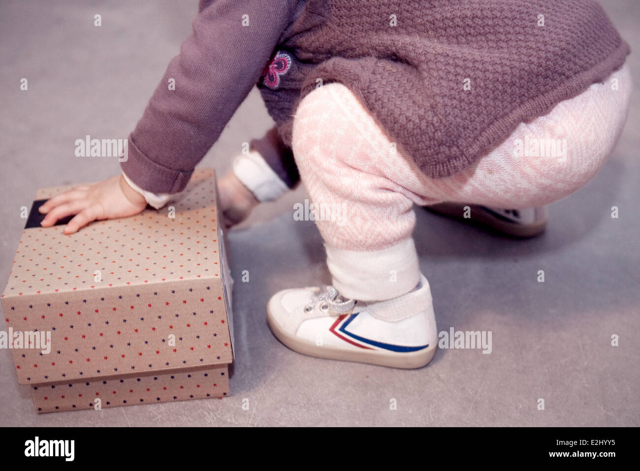 Little boy opening box, cropped Stock Photo - Alamy