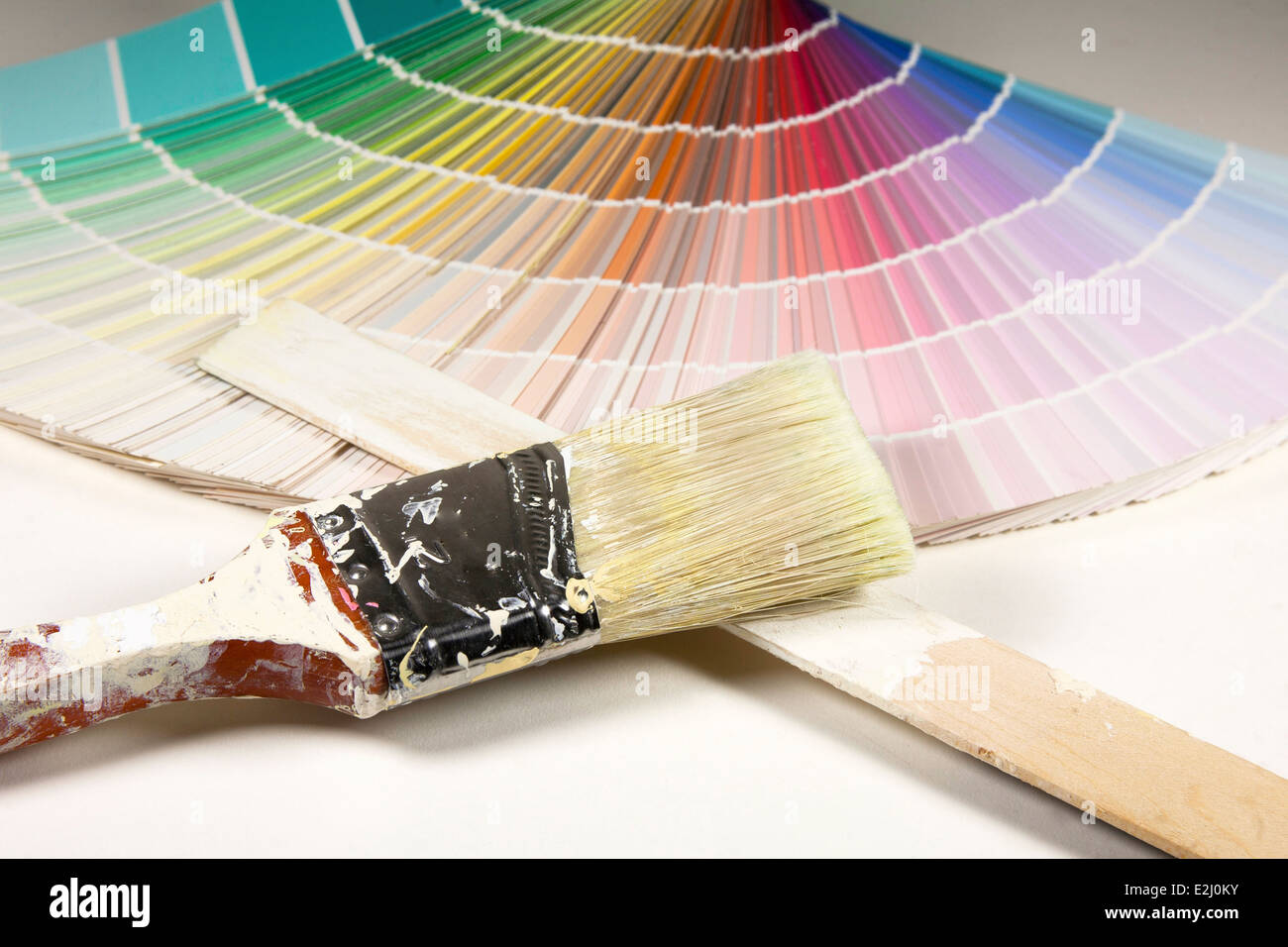 Color samples for paint with brush and stirrer Stock Photo - Alamy