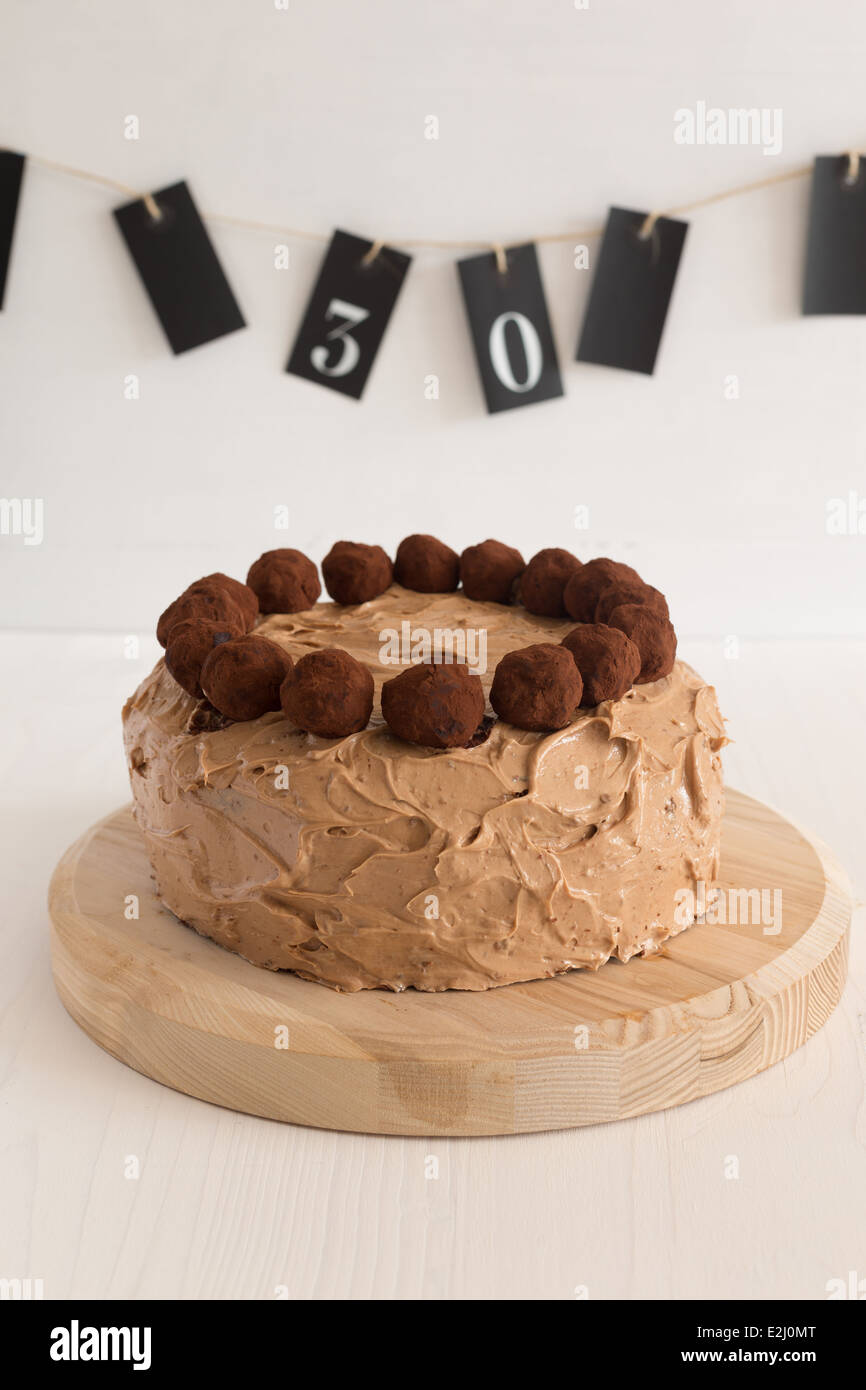 Chocolate truffles cake for a birthday Stock Photo - Alamy
