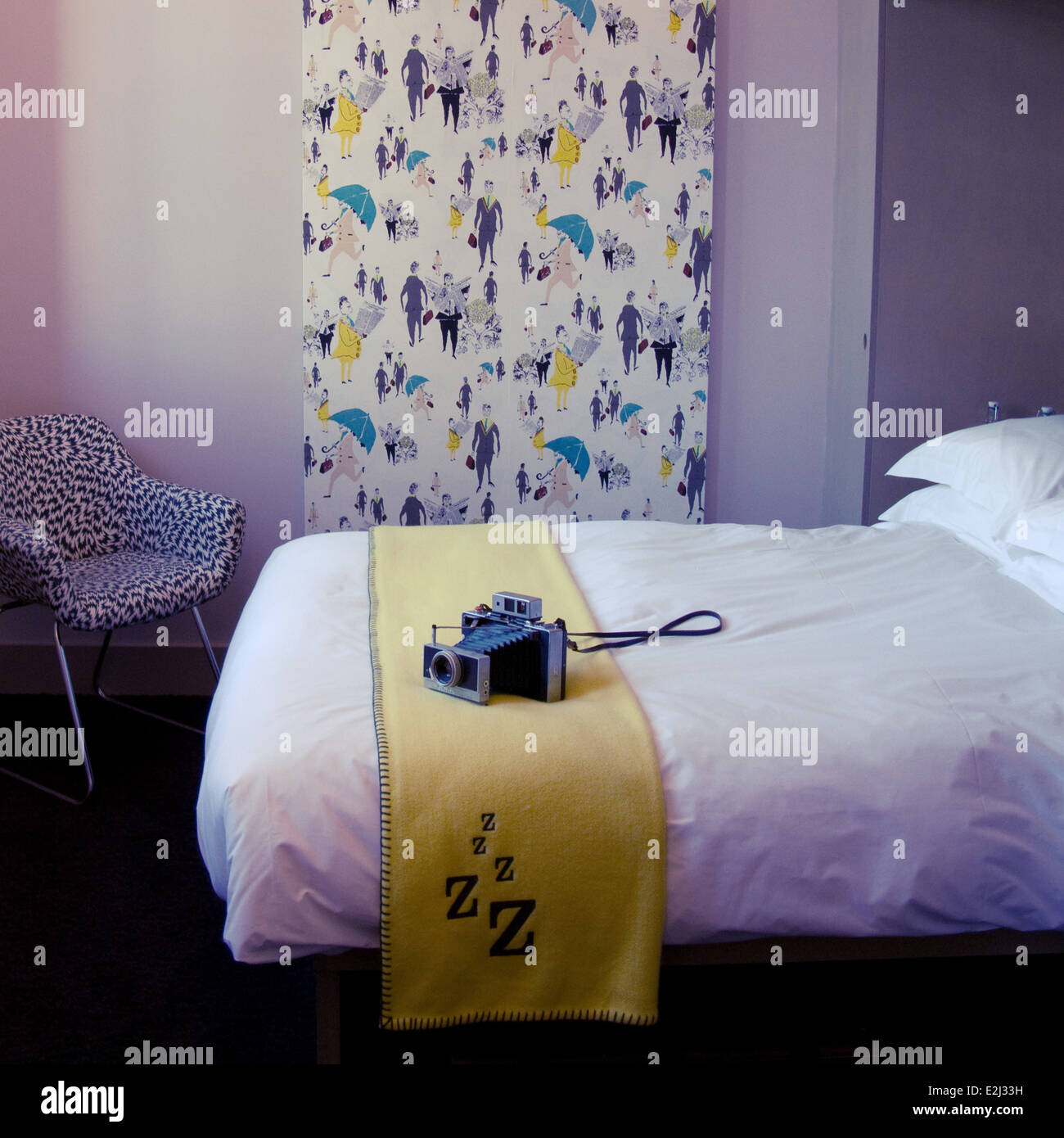 Old-fashioned camera on bed in retro bedroom Stock Photo - Alamy
