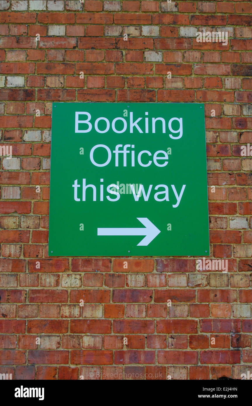 Booking office sign Stock Photo - Alamy