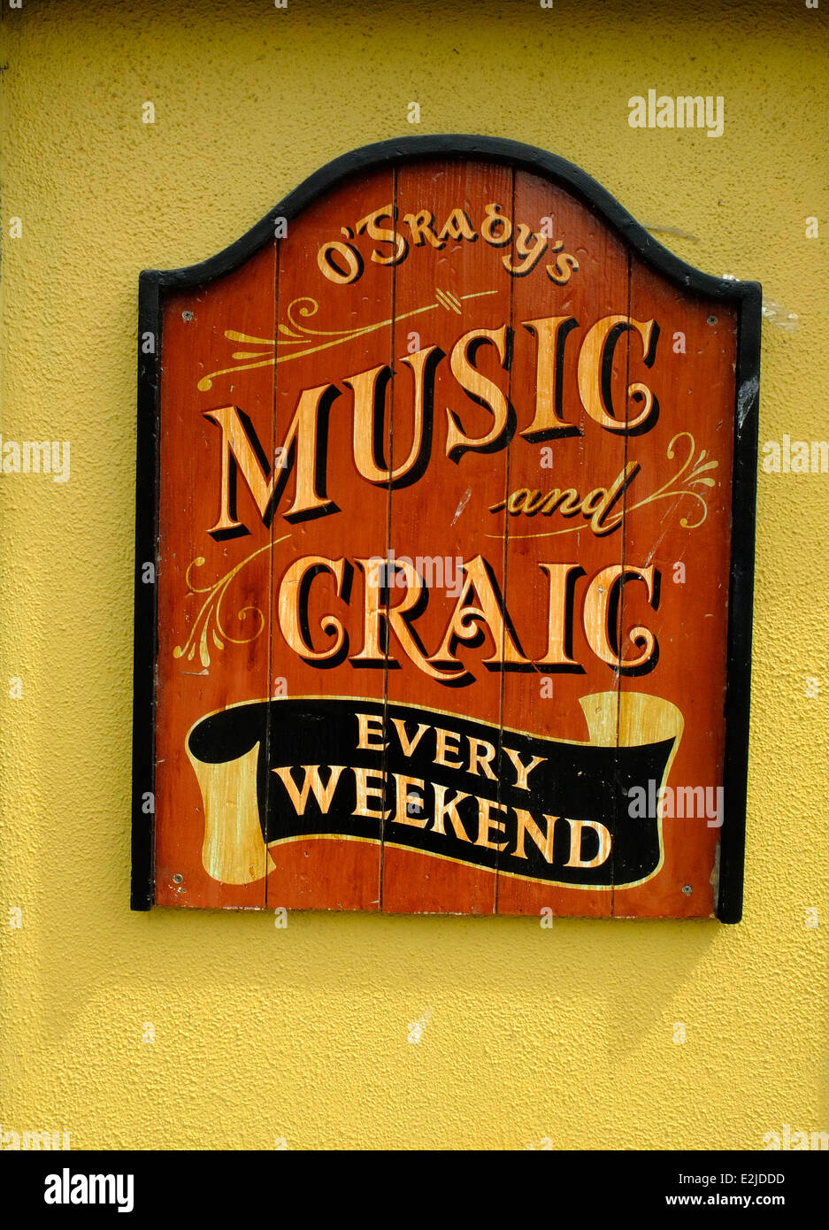 Irish pub sign - music and craic Stock Photo - Alamy
