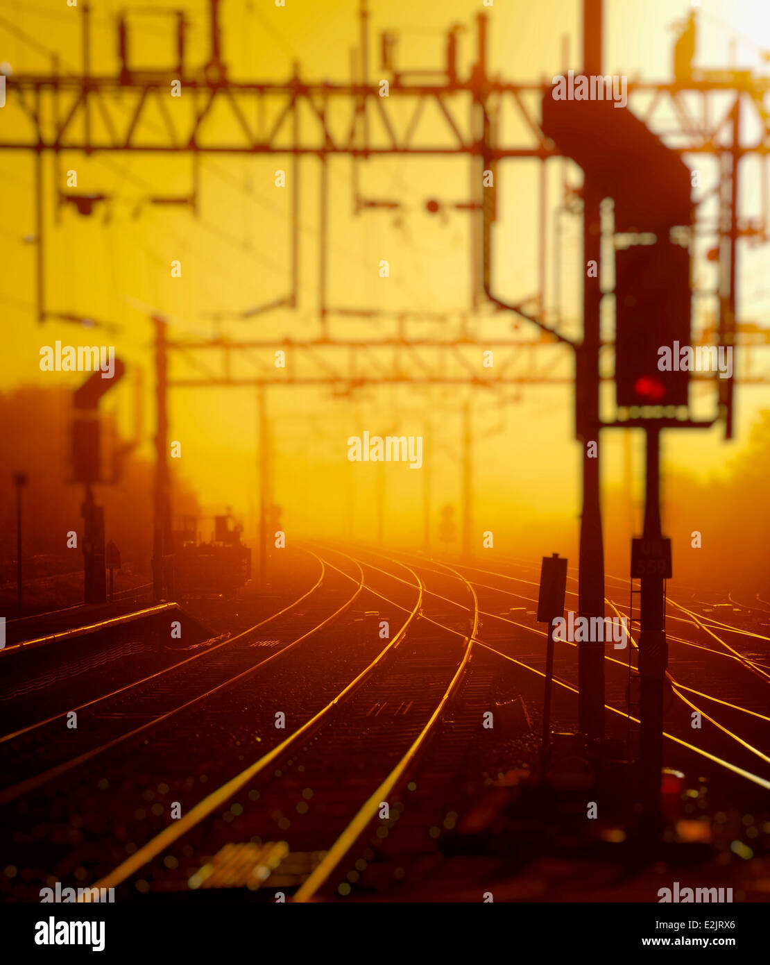 Sunrise over train tracks hi-res stock photography and images - Alamy