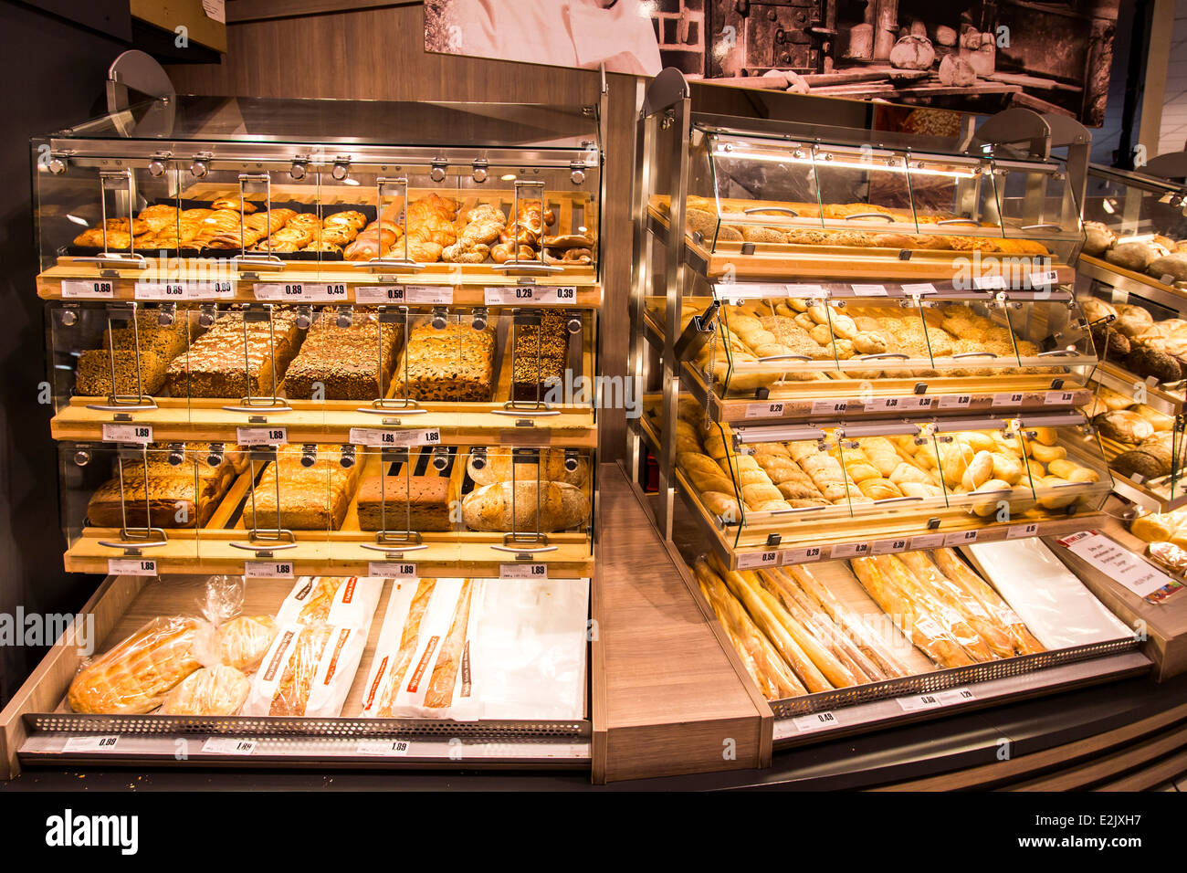 Shelf with food in a supermarket. Self service bakery Stock Photo ...