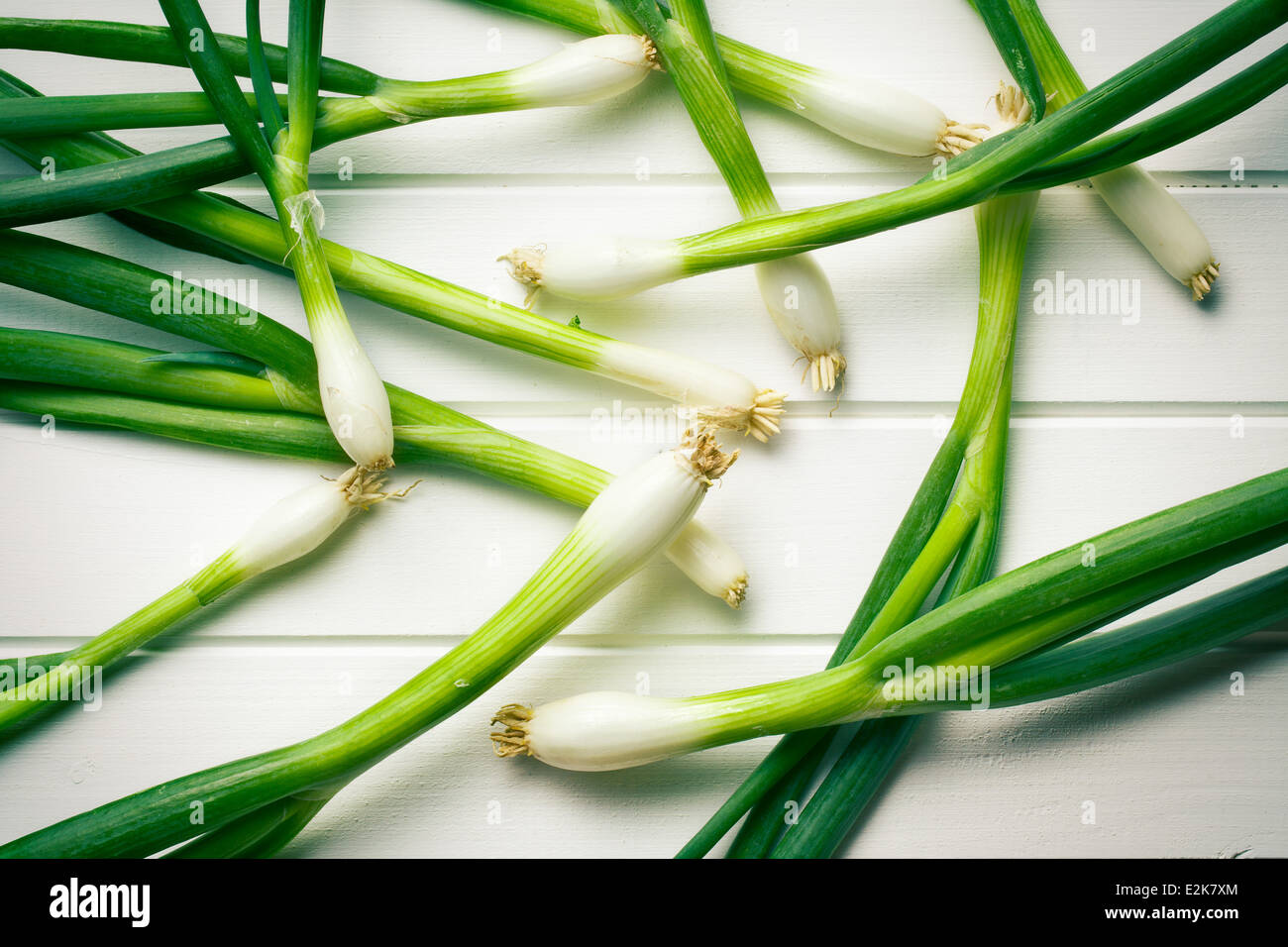 the spring onion on white table Stock Photo - Alamy