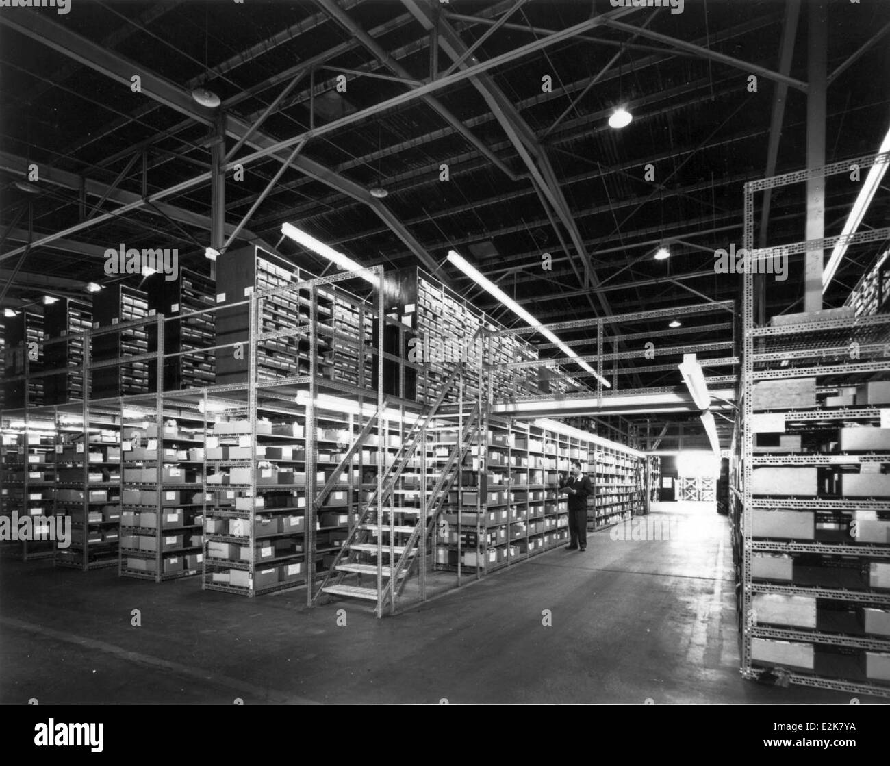 This image depicts a supply warehouse at Naval Air Station North Island ...