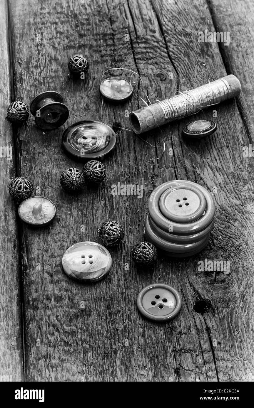 Fasten the button Black and White Stock Photos & Images - Alamy