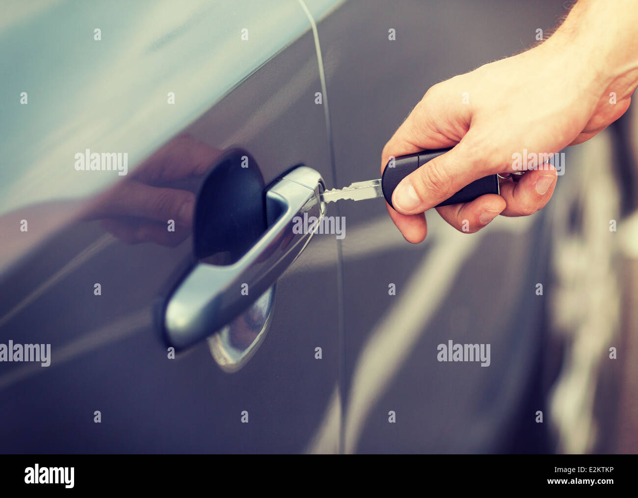 man with car key outside Stock Photo - Alamy
