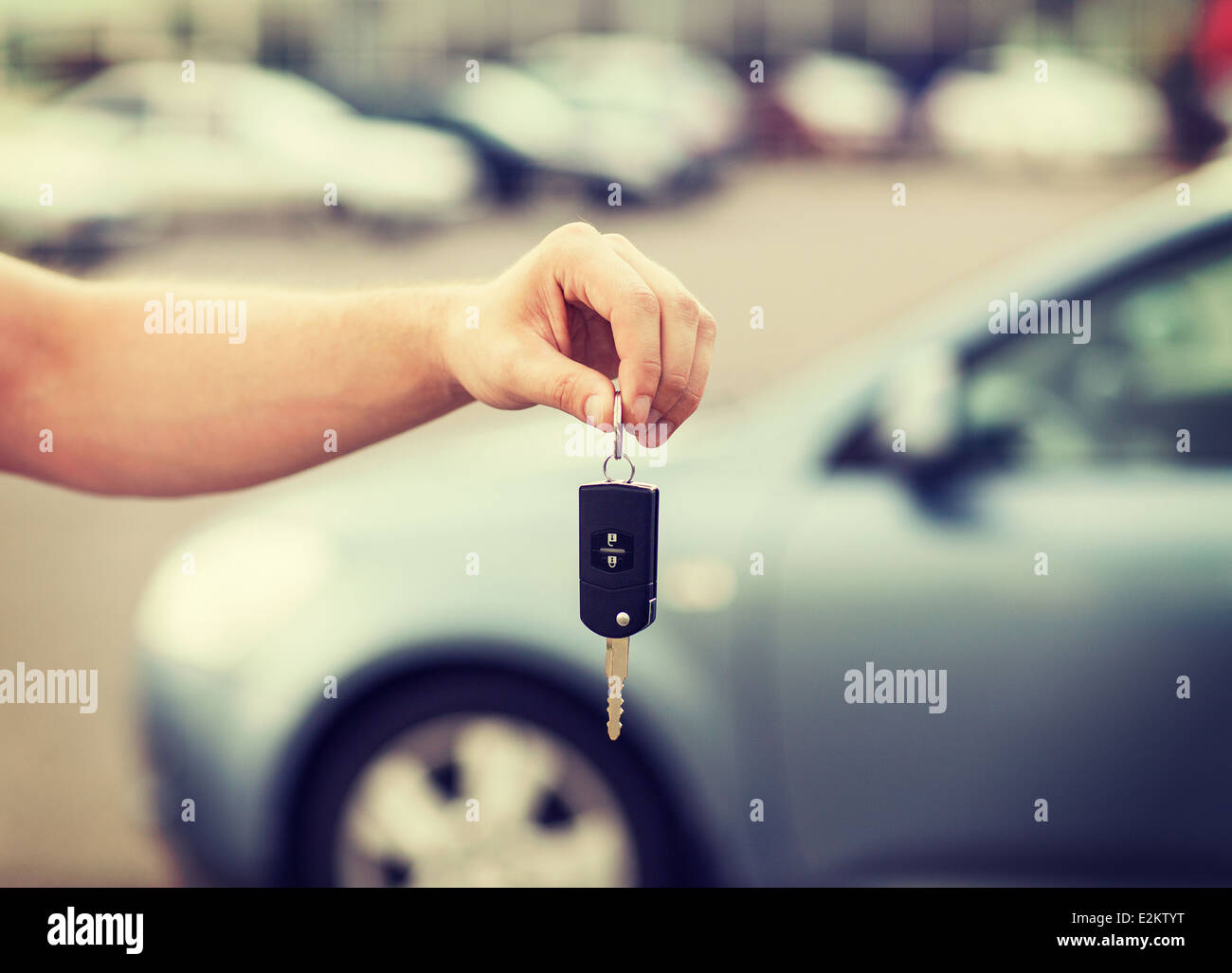 man with car key outside Stock Photo - Alamy
