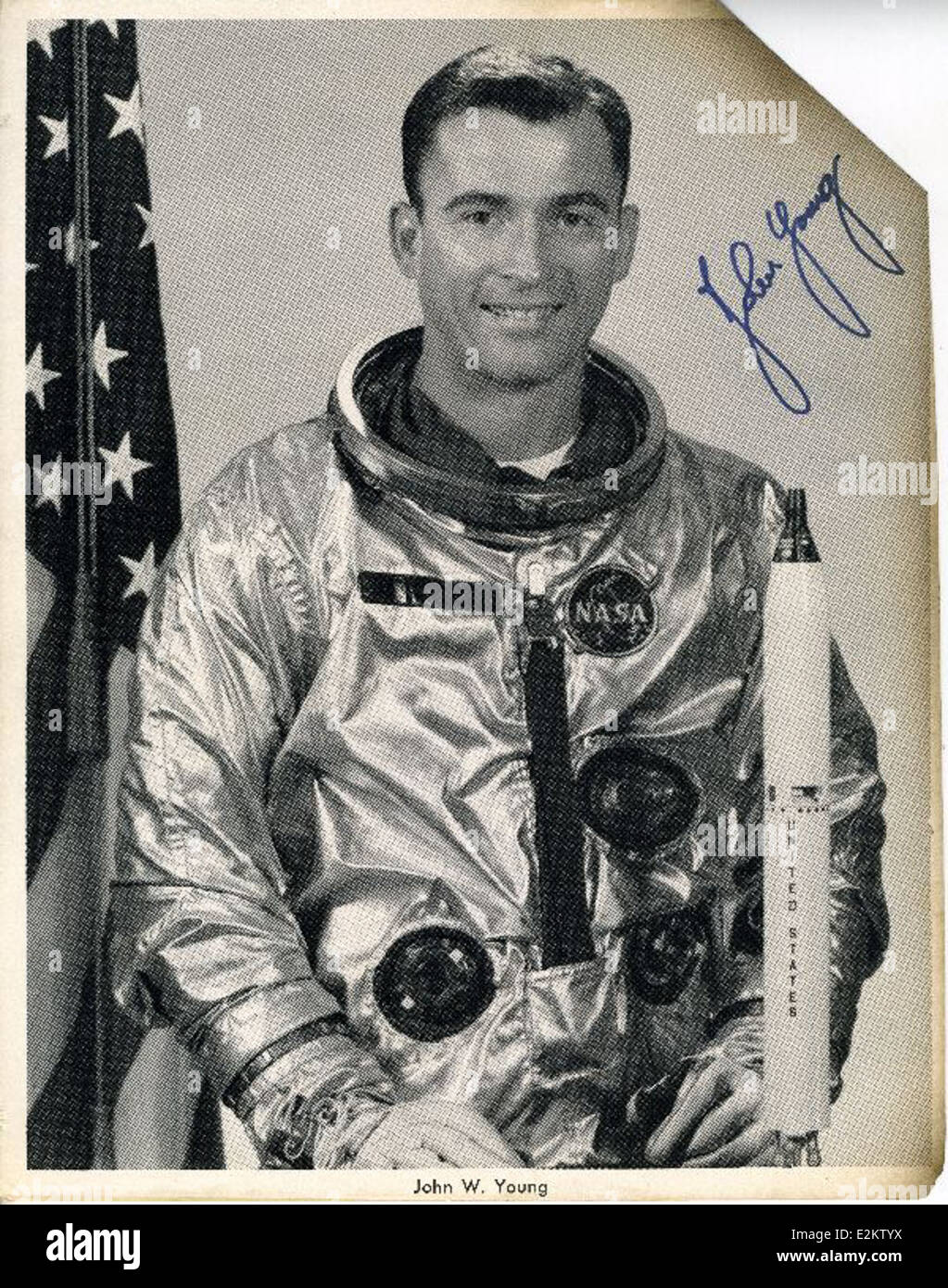 This image features an autograph from John Young, a pioneering NASA ...