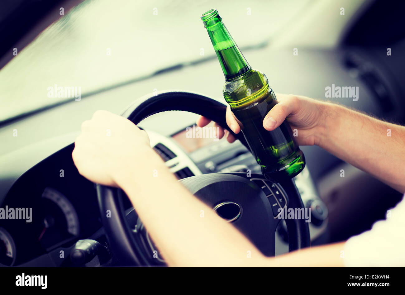 man drinking alcohol while driving the car Stock Photo - Alamy