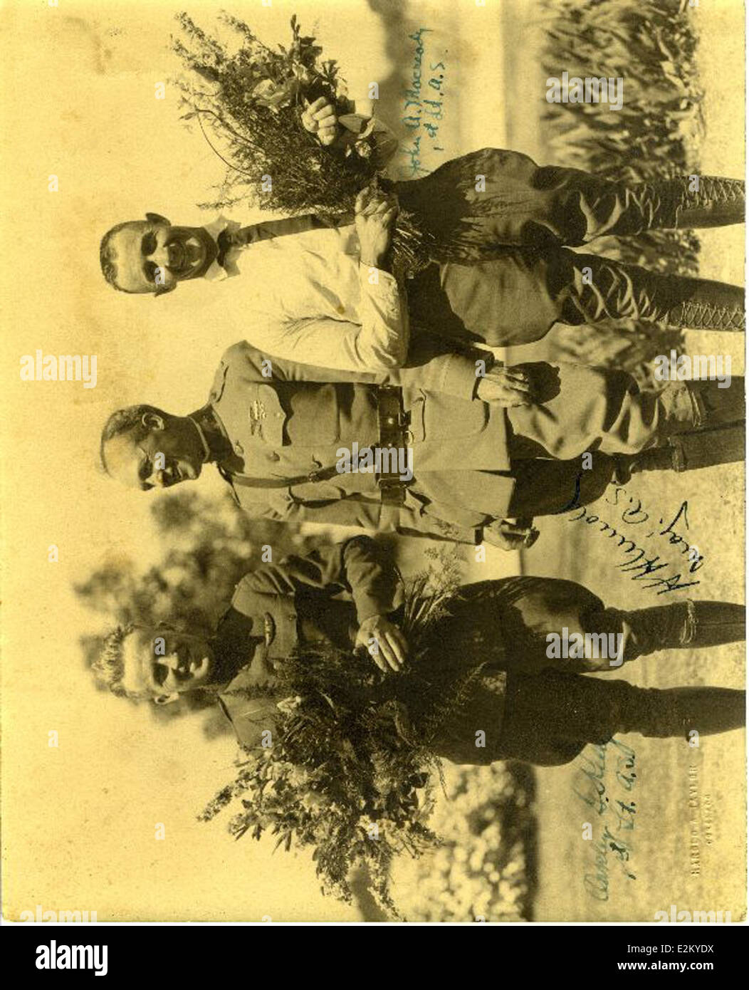 This photograph features notable aviators including Henry 'Hap' Arnold ...