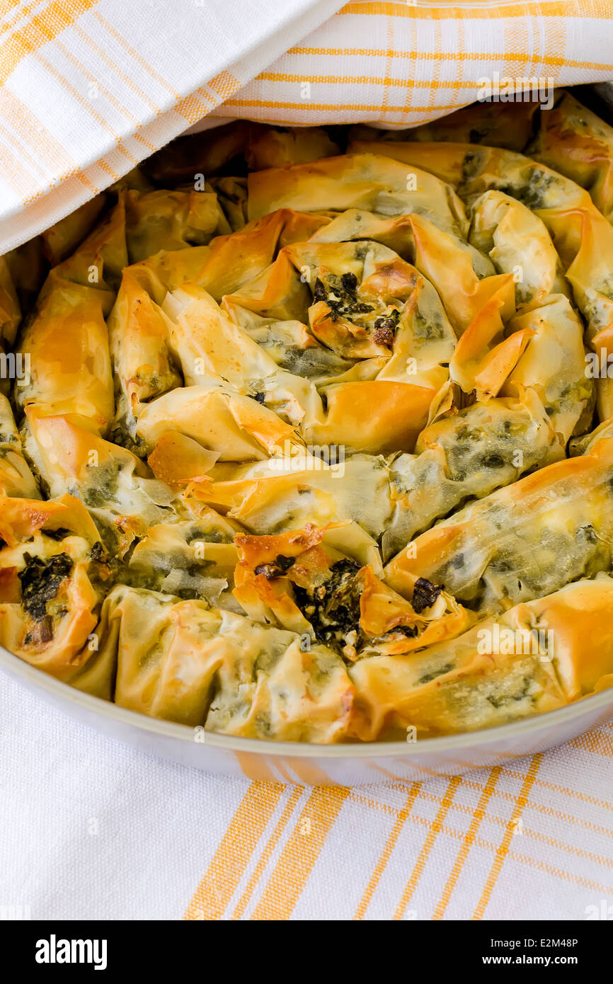 Spiral pastry with cheese and dock Stock Photo - Alamy