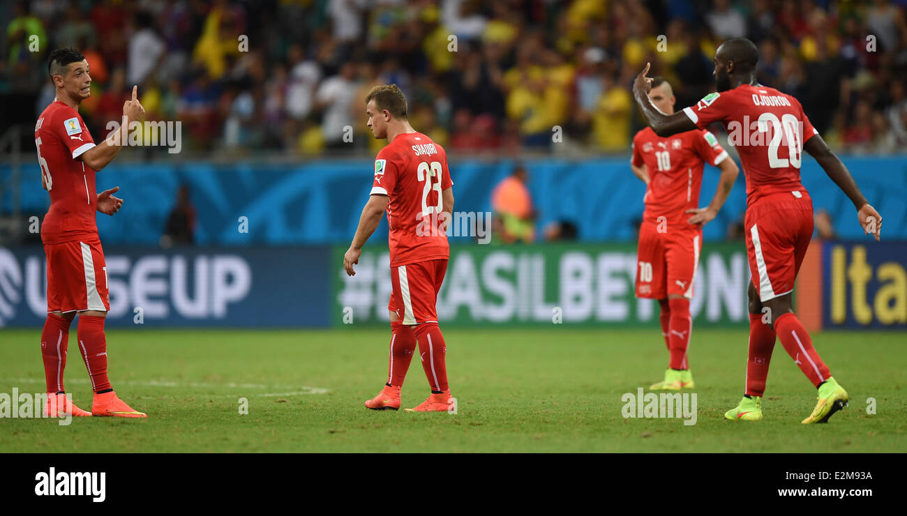 Switzerland's Blerim Dzemaili (L) and Johan Djouro (R) discuss after ...