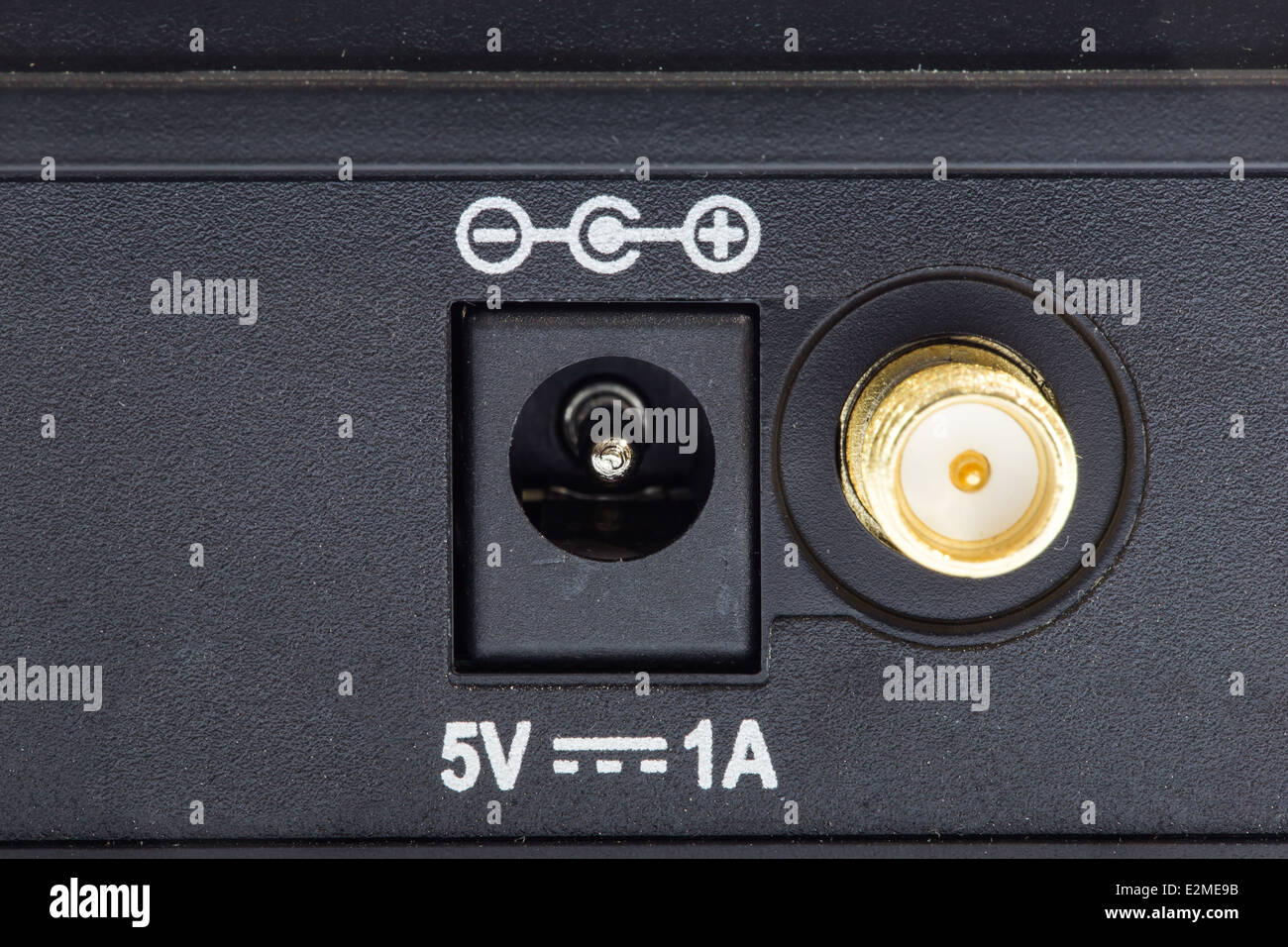 Power port of black access point router Stock Photo - Alamy