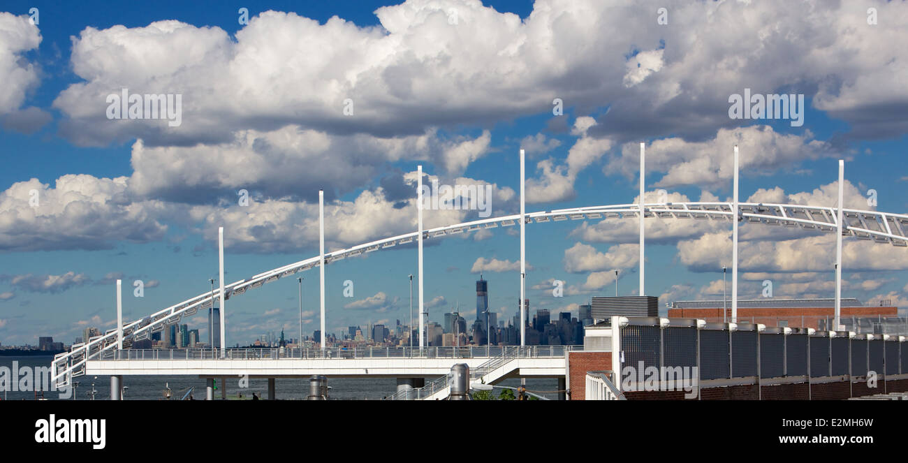 Waterfront near the St. George's Ferry terminal with the skyline of ...