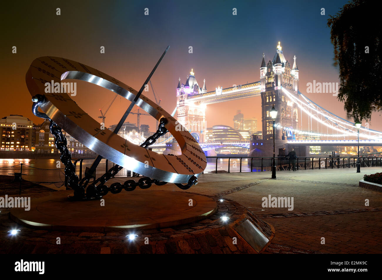 Sundial and Tower Bridge at waterfront in London Stock Photo - Alamy
