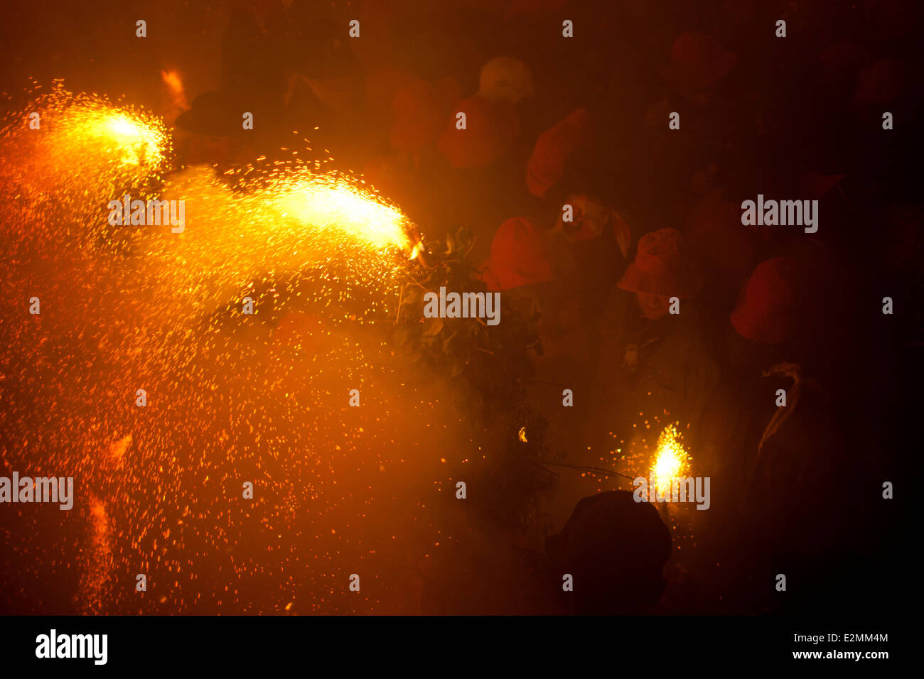 Berga, Spain. 19th June, 2014. Firecracker performance are seen during ...