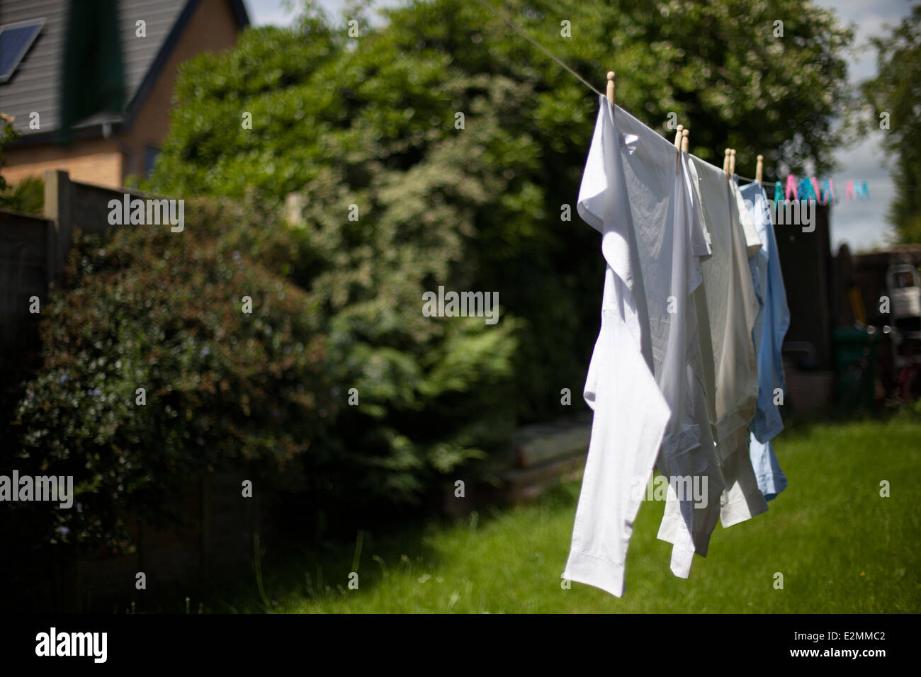Clothes on washing line summer Stock Photo - Alamy