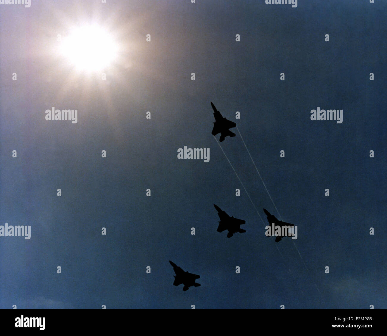 Four F-15 Eagle aircraft perform a Missing Man formation Stock Photo ...