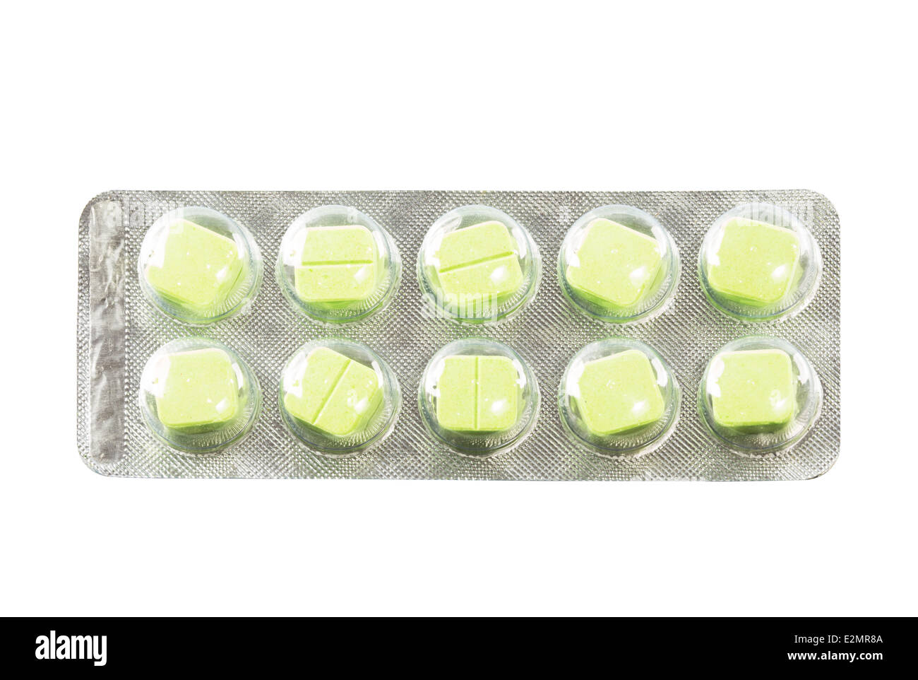 Green pills in transparent blister packs isolated on white background ...