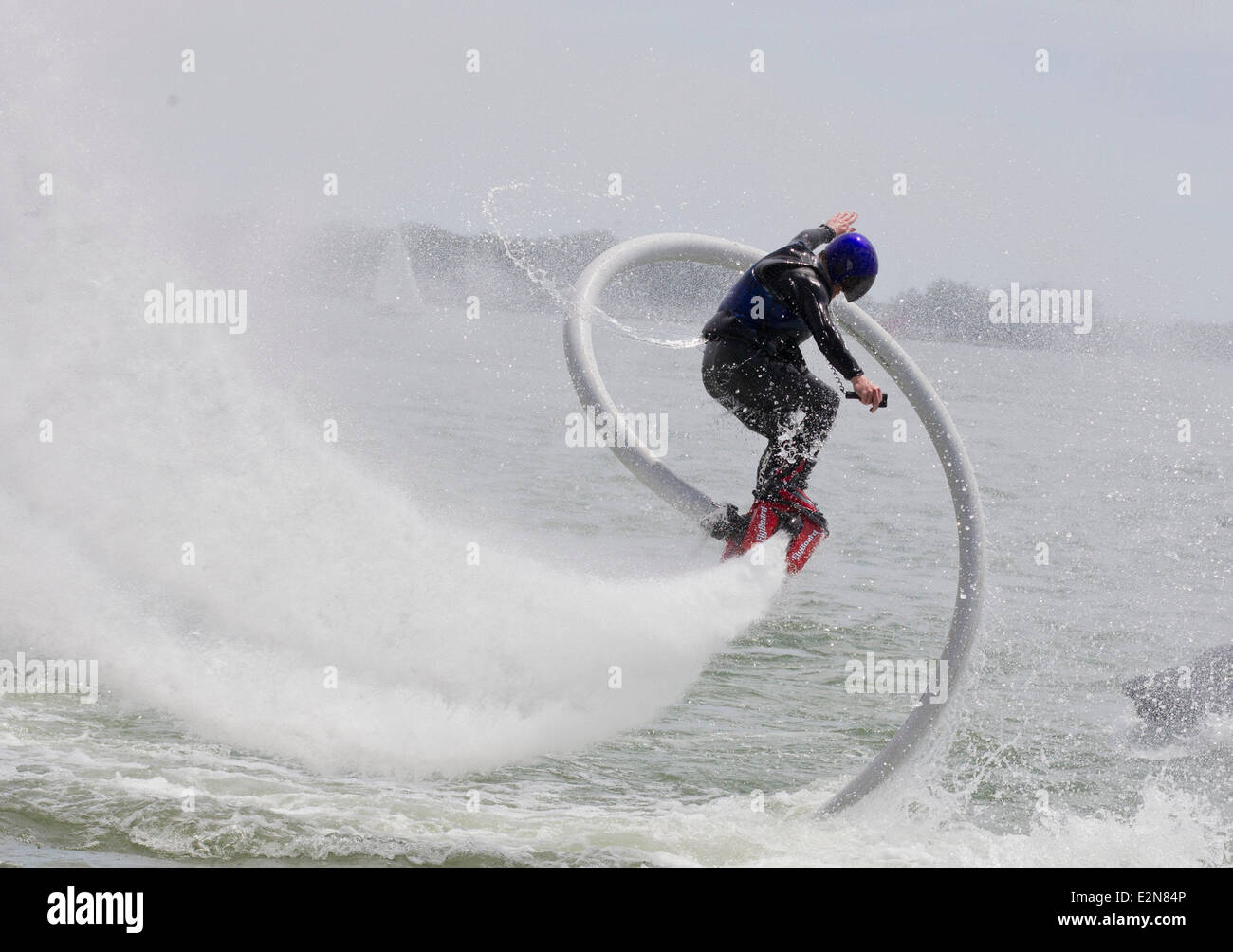Toronto, Canada. 20th June, 2014. A flyboard rider performs with a ...