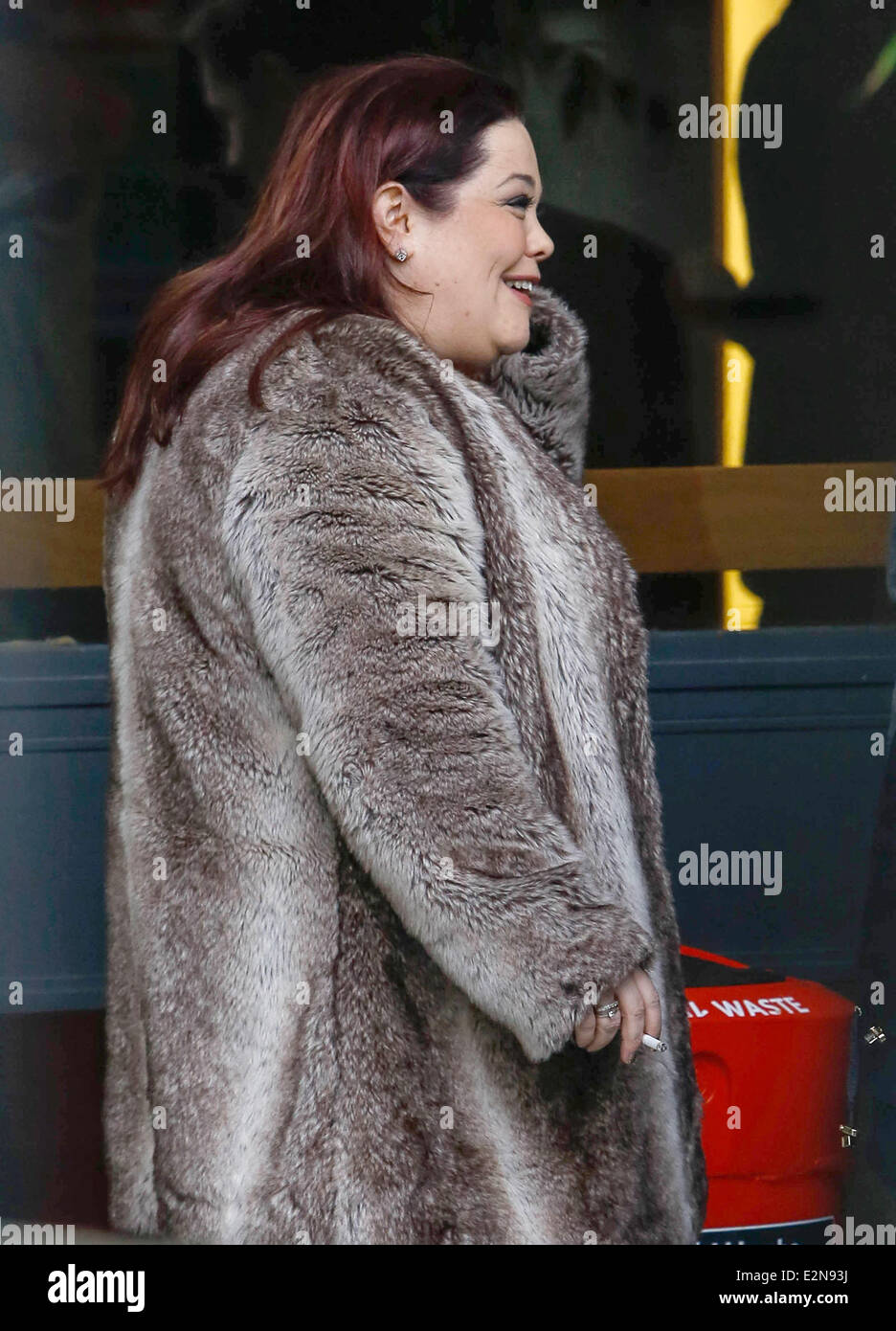 Lisa Riley smokes a cigarette whilst standing outside the ITV studios ...