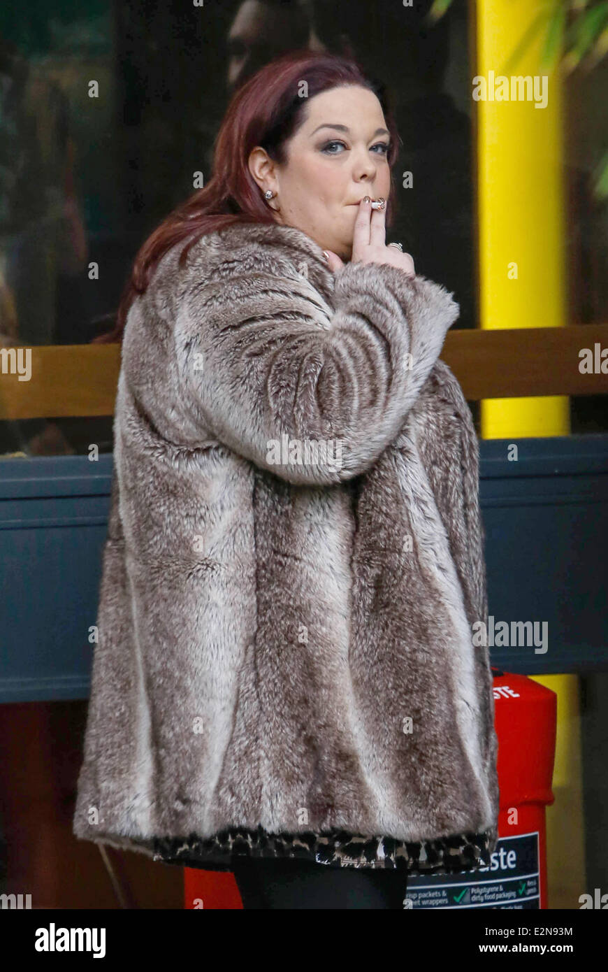 Lisa Riley smokes a cigarette whilst standing outside the ITV studios ...