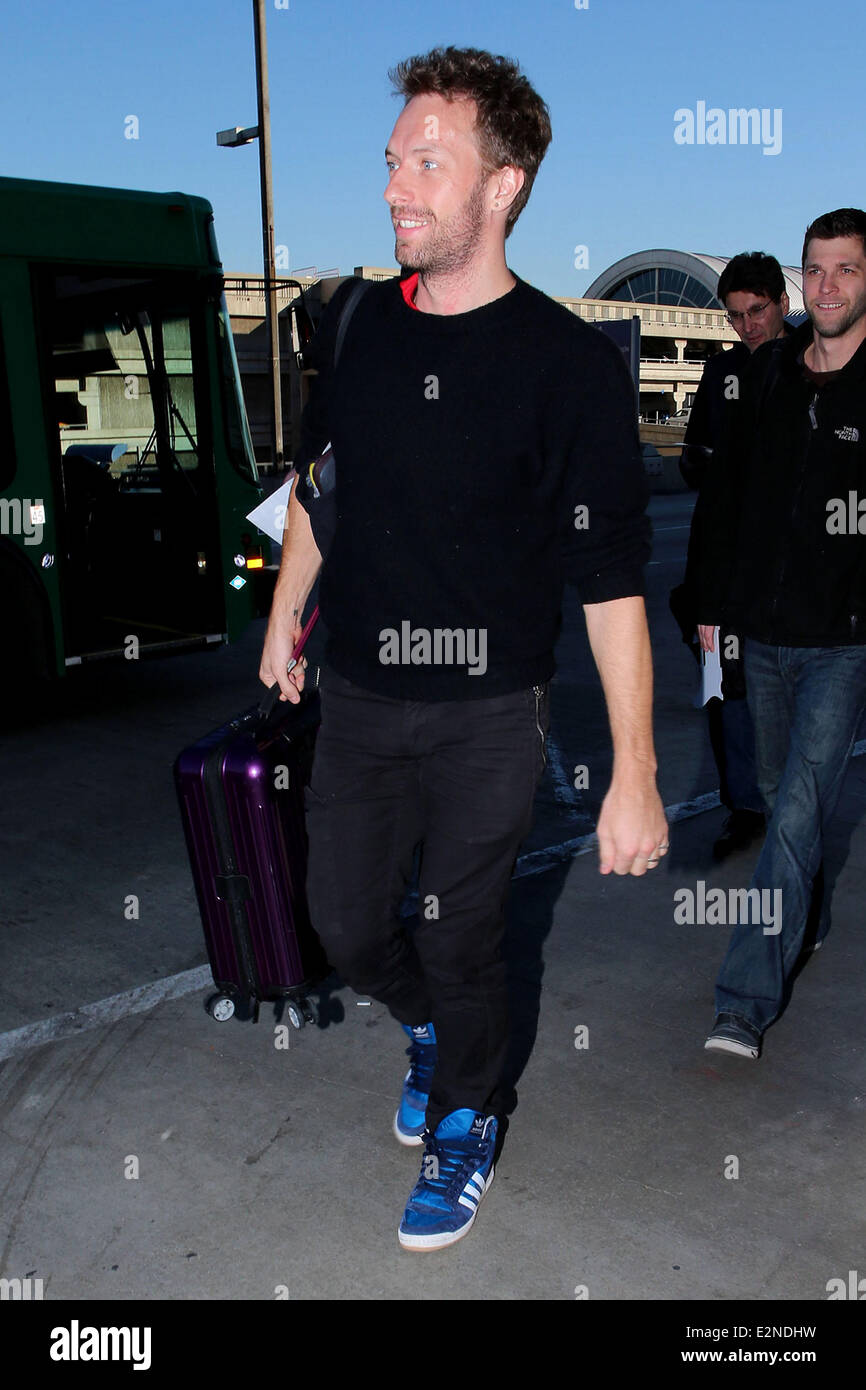 Coldplay frontman in good spirits as he arrives at LAX airport ...