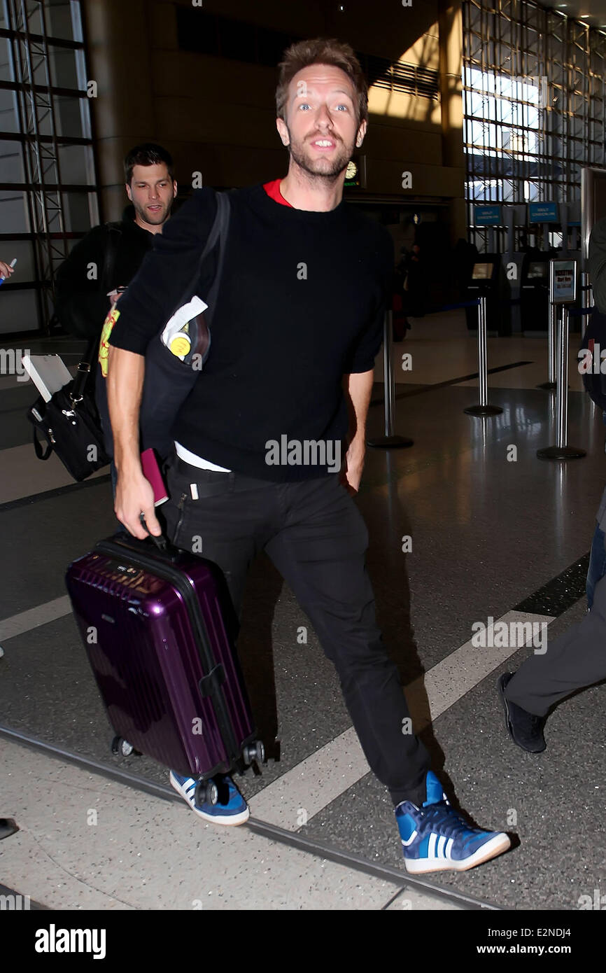 Coldplay frontman in good spirits as he arrives at LAX airport ...